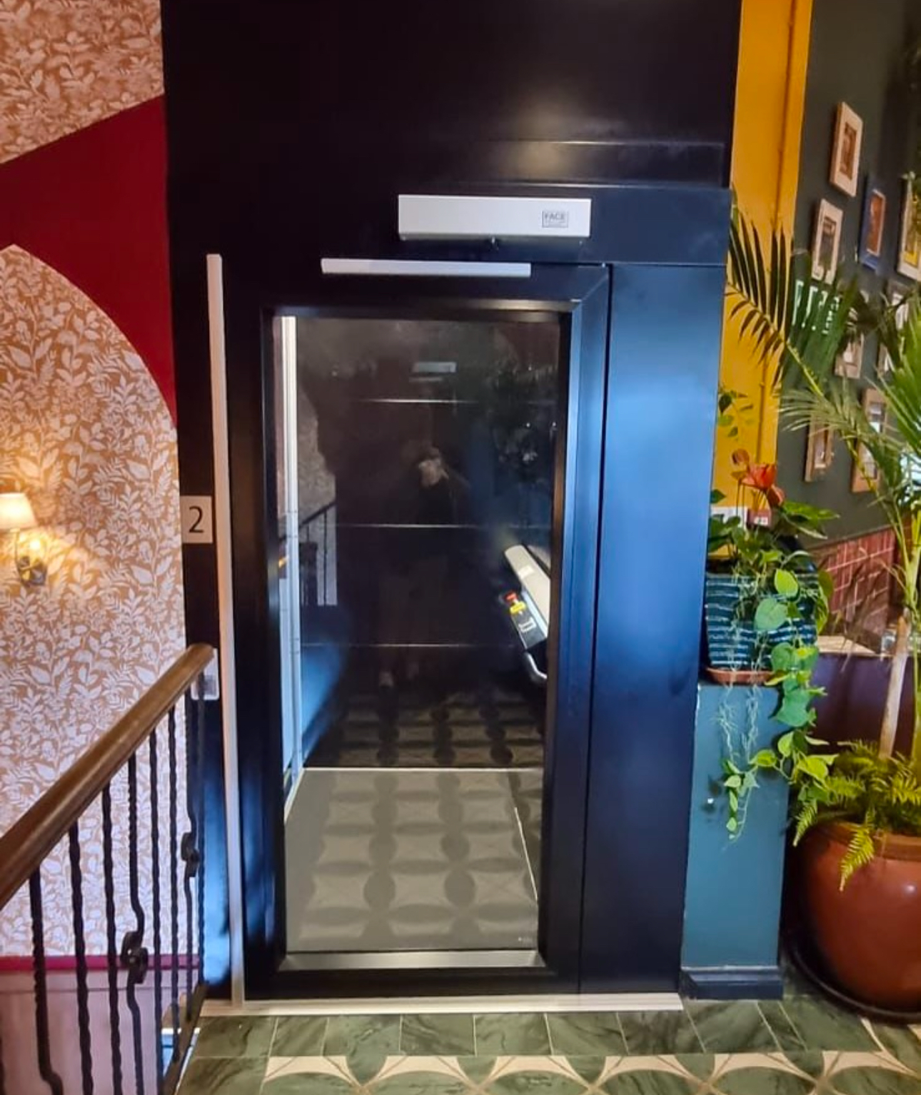 Black and glass vertical platform lift for Retail center , Groenkloof ...